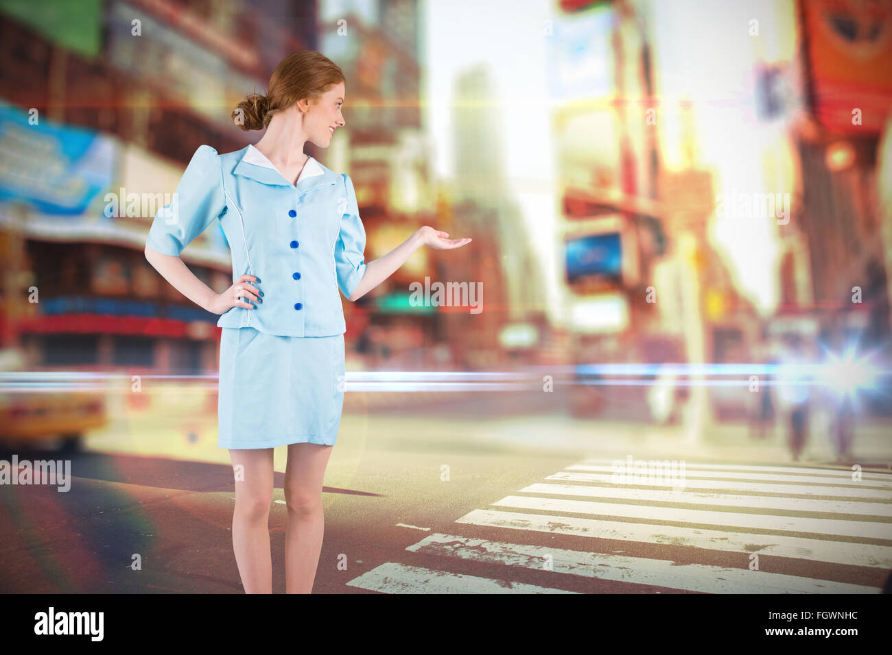 Composite image of pretty air hostess presenting with hand Stock Photo ...