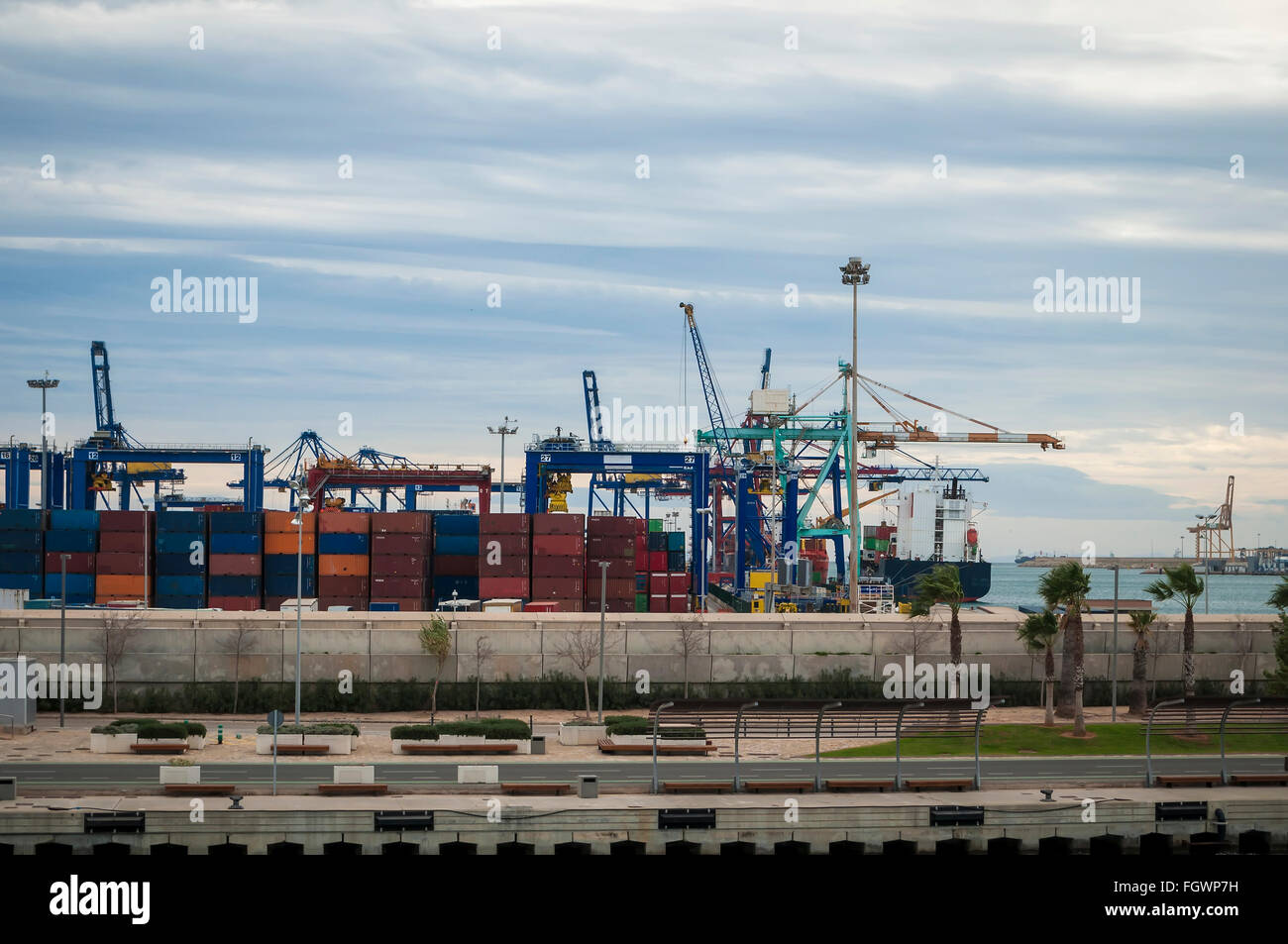 view of the containers in port, unloading a ship Stock Photo - Alamy
