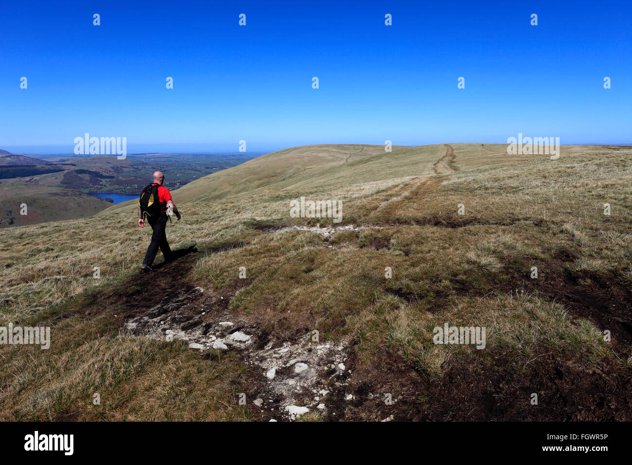 Walker on High Raise fell, High Street, Martindale Common valley, Lake ...