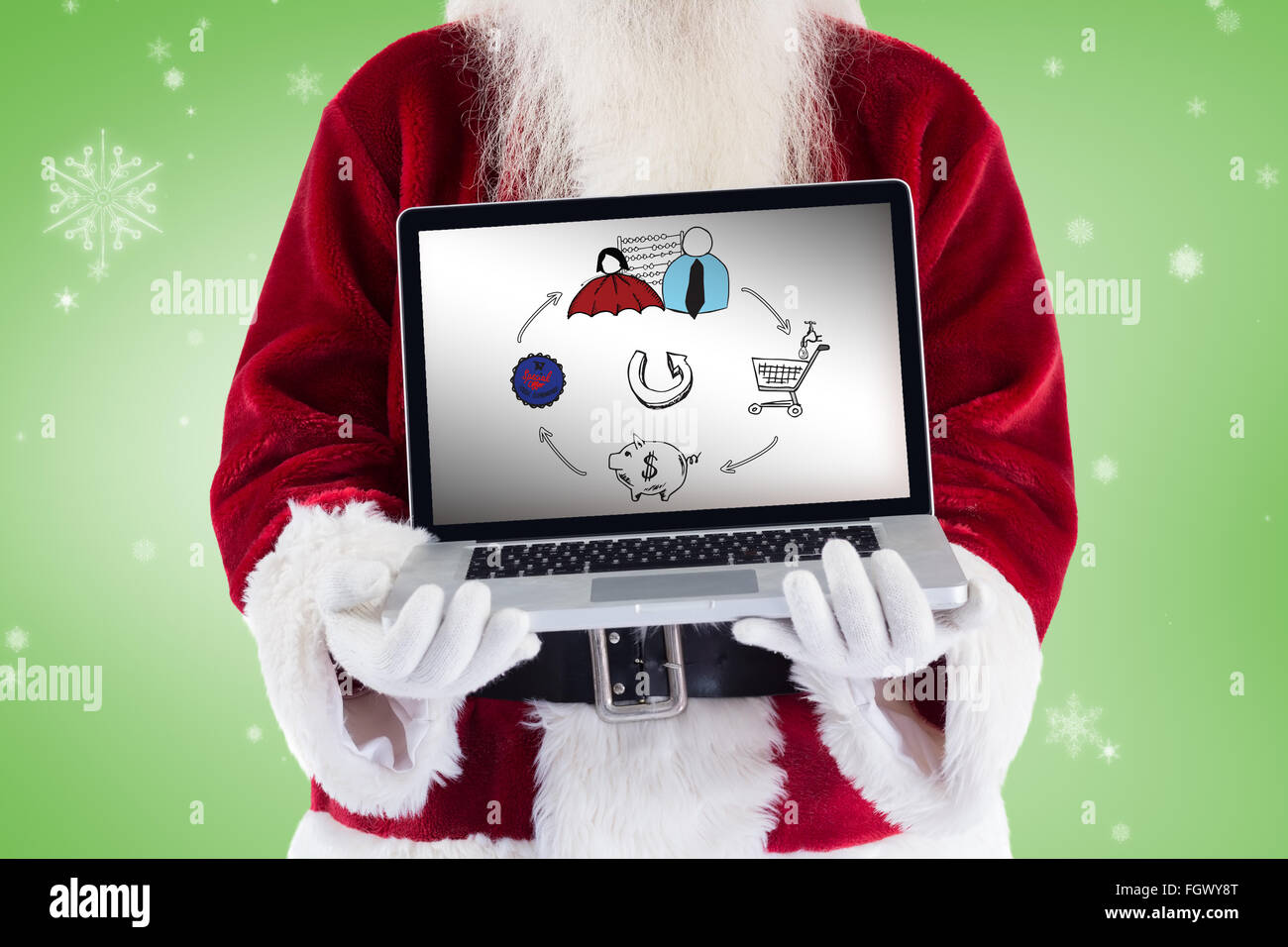 Santa claus presents a laptop Stock Photo - Alamy