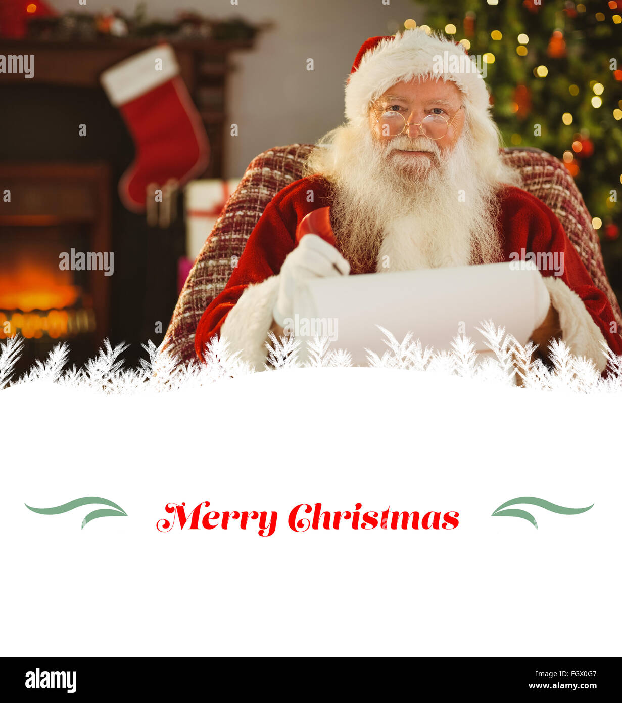 happy santa writing list with a quill Stock Photo - Alamy