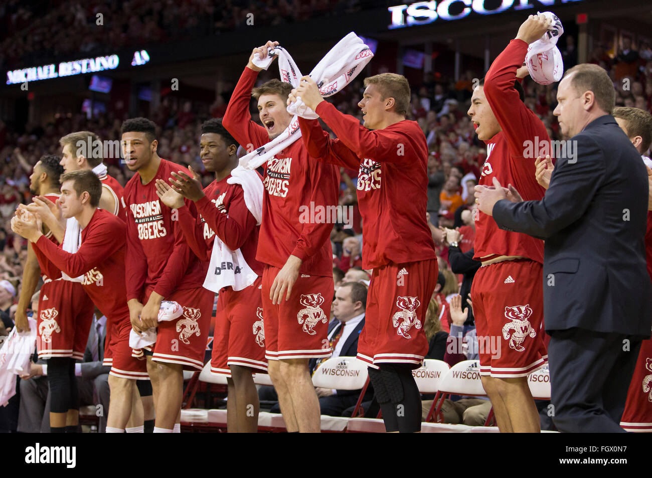 Madison, WI, USA. 21st Feb, 2016. Wisconsin bench reacts after a basket ...