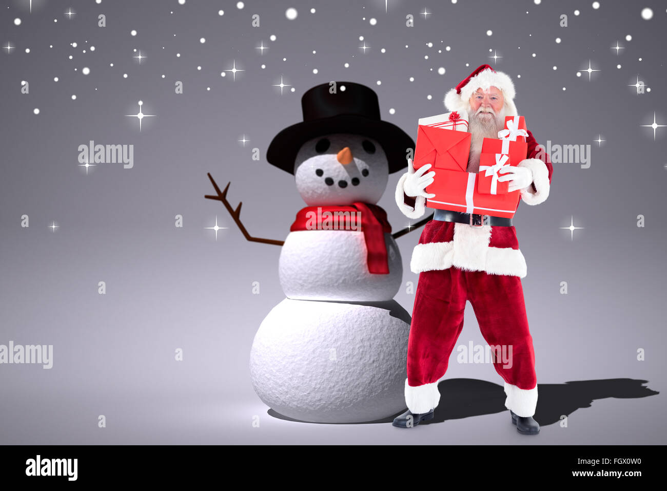 Composite image of santa carries a few presents Stock Photo - Alamy