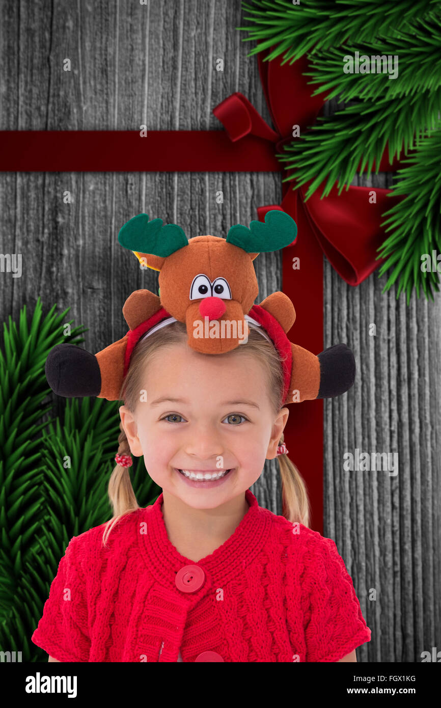 Composite image of cute little girl wearing rudolph headband Stock ...