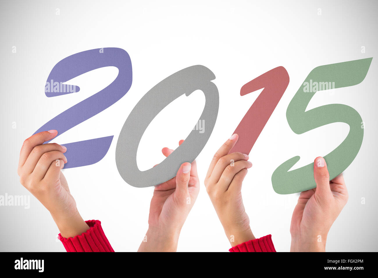 Composite image of hands holding poster Stock Photo - Alamy