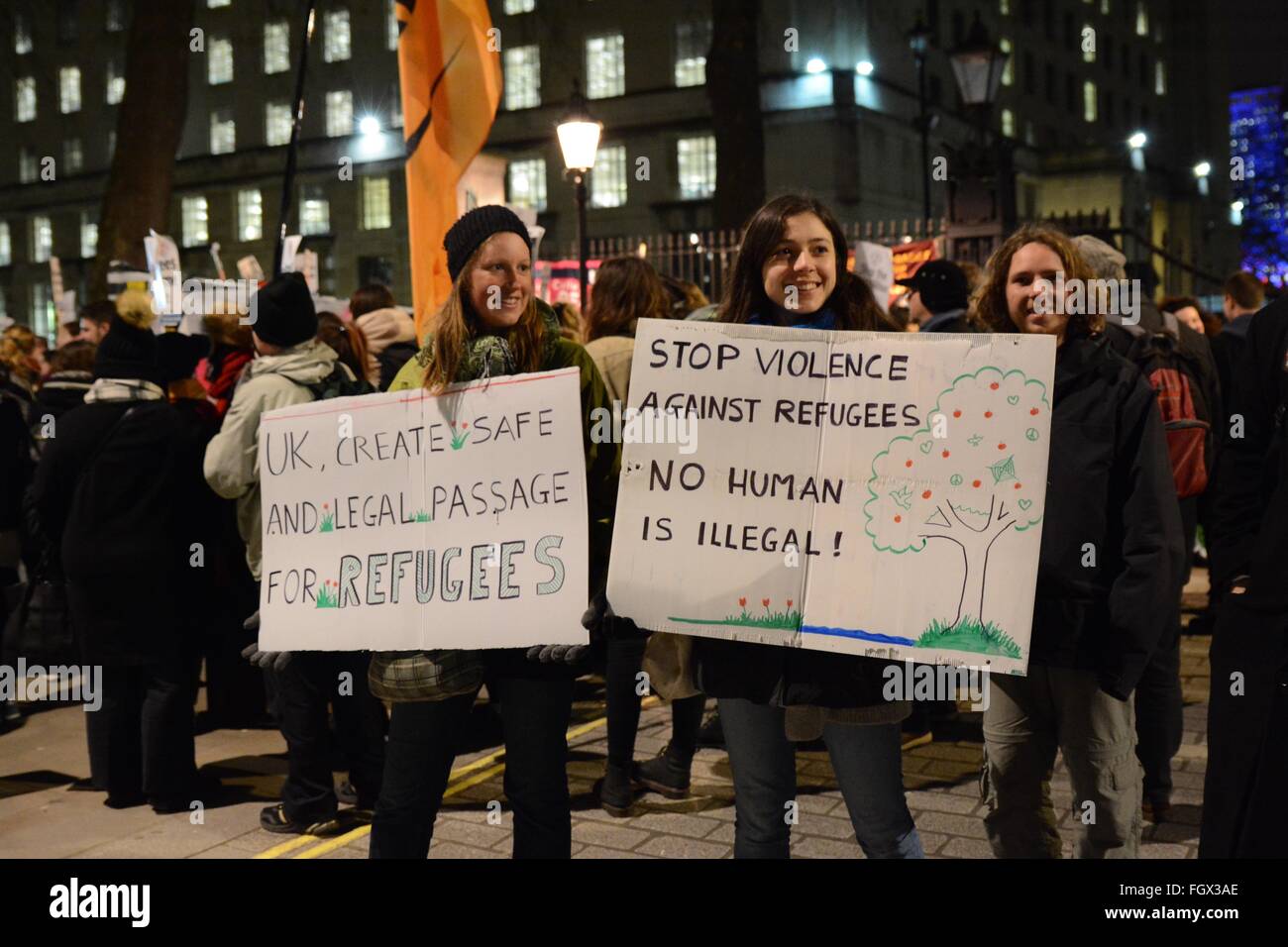 London, UK. 22nd February, 2016. Protesters smile holding their ...