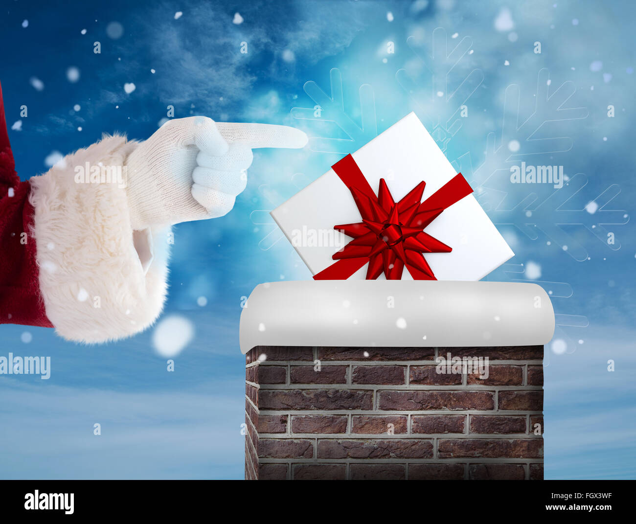 Composite image of santa claus points at something Stock Photo - Alamy