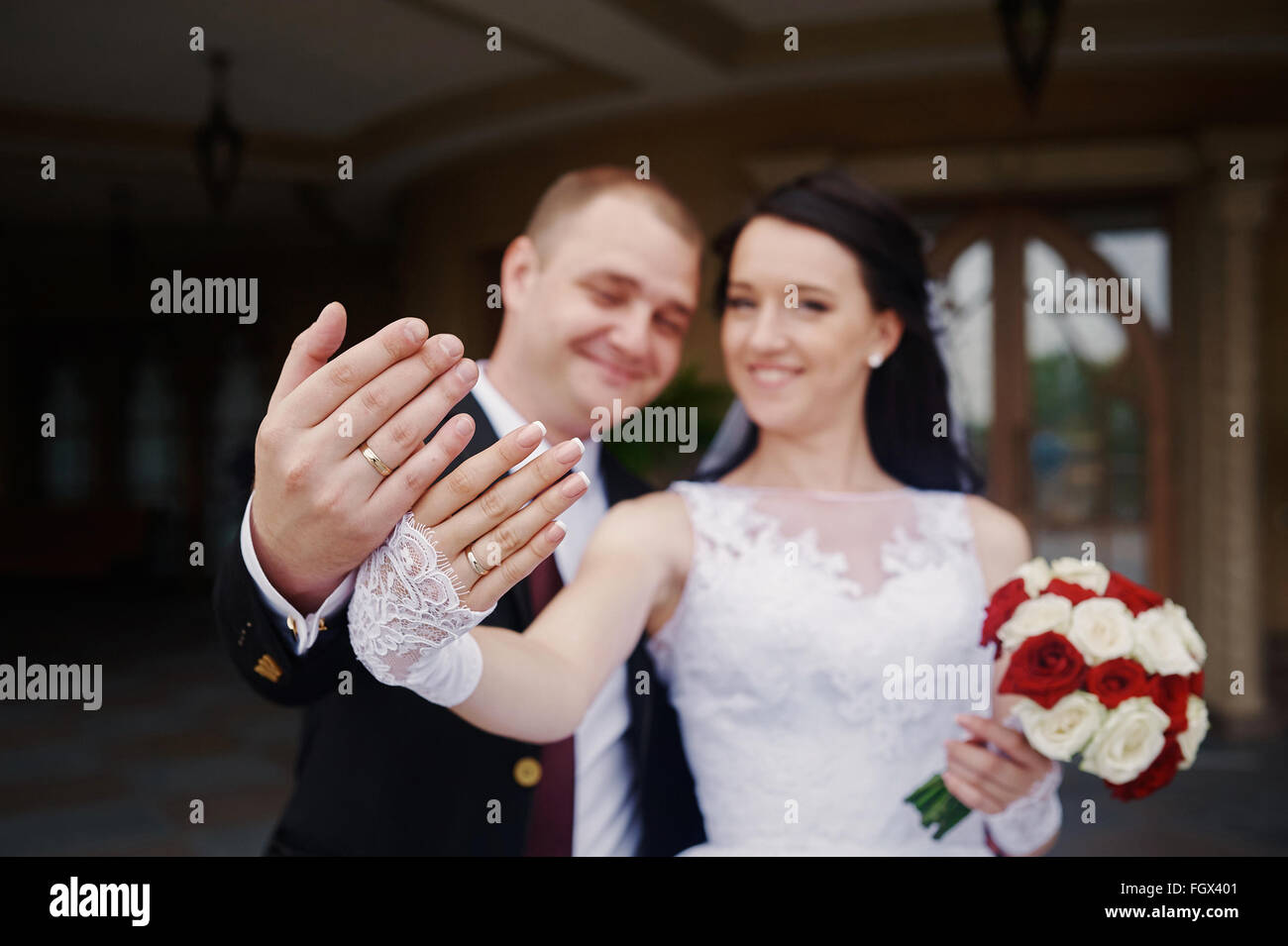 Entwined wedding rings hi-res stock photography and images - Alamy