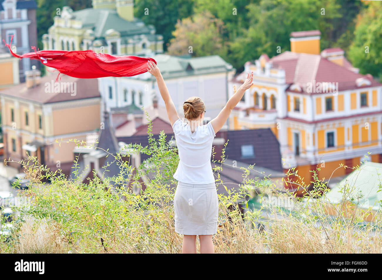 Free happy woman waving a red handkerchief Stock Photo - Alamy