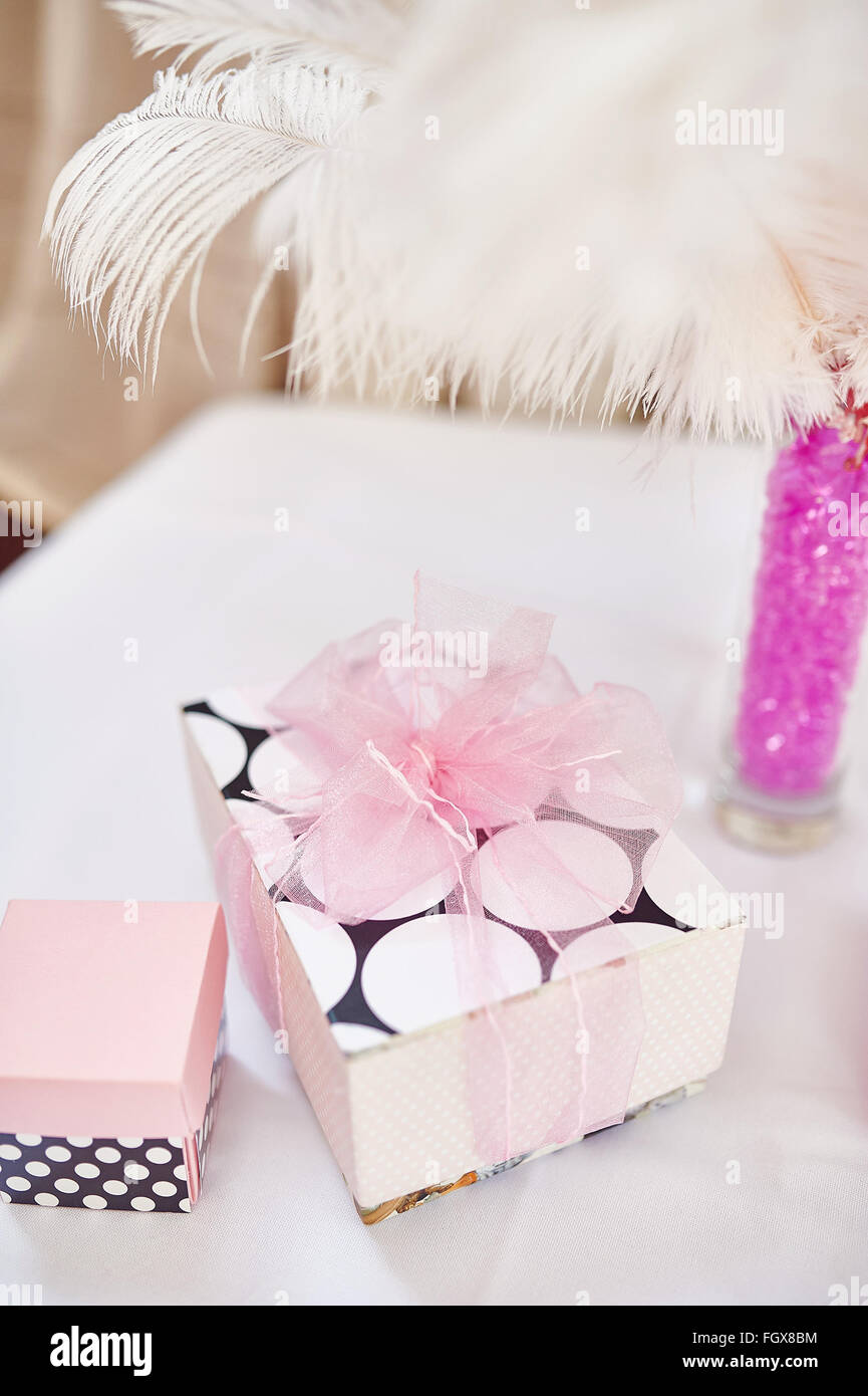 Beautiful gift box with ribbon bow for wedding Stock Photo - Alamy