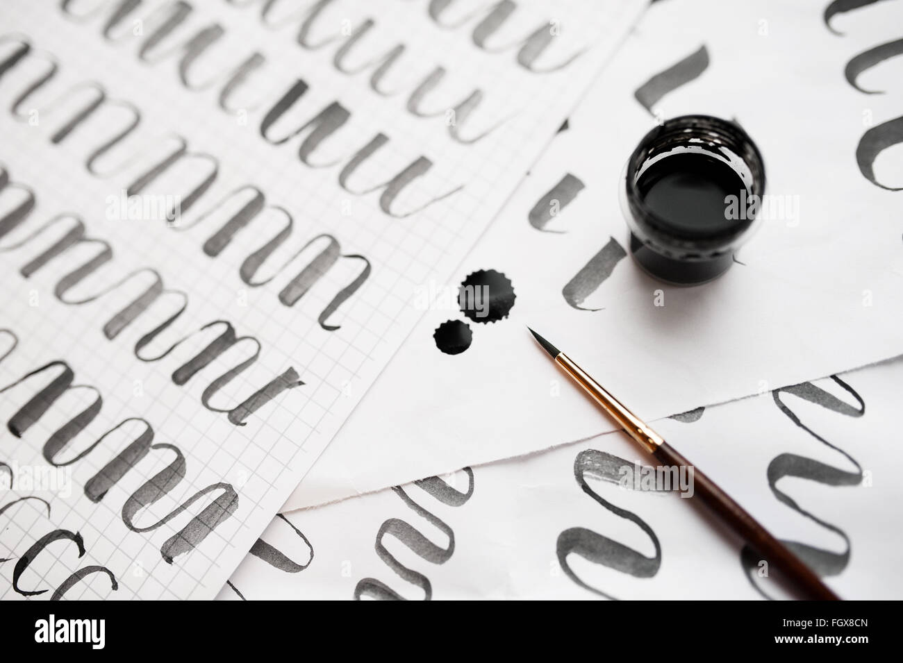learning calligraphy - paper with example and brush and ink Stock Photo ...