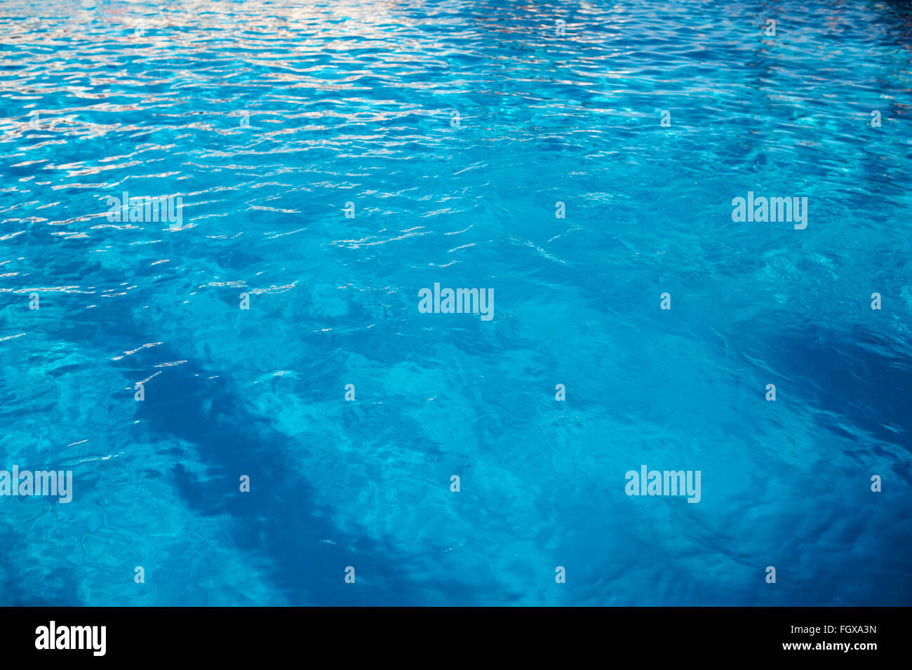 water texture in a swimming pool pattern background Stock Photo - Alamy