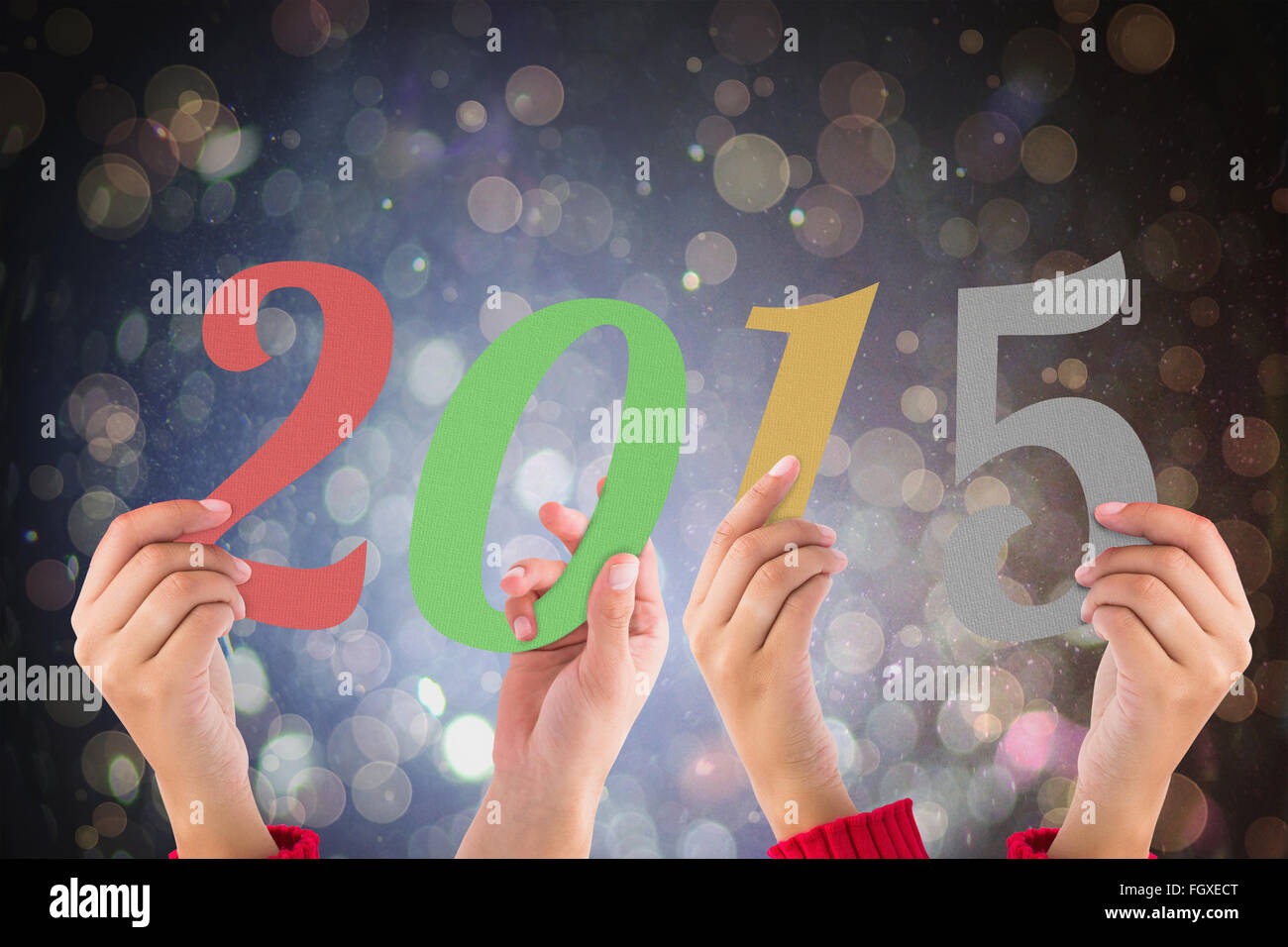 Composite image of hands holding poster Stock Photo - Alamy