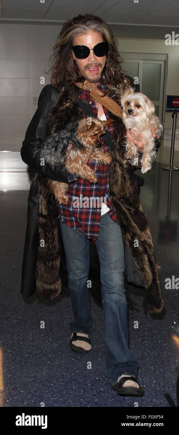 Steven Tyler arrives at Los Angeles International Airport with his two ...