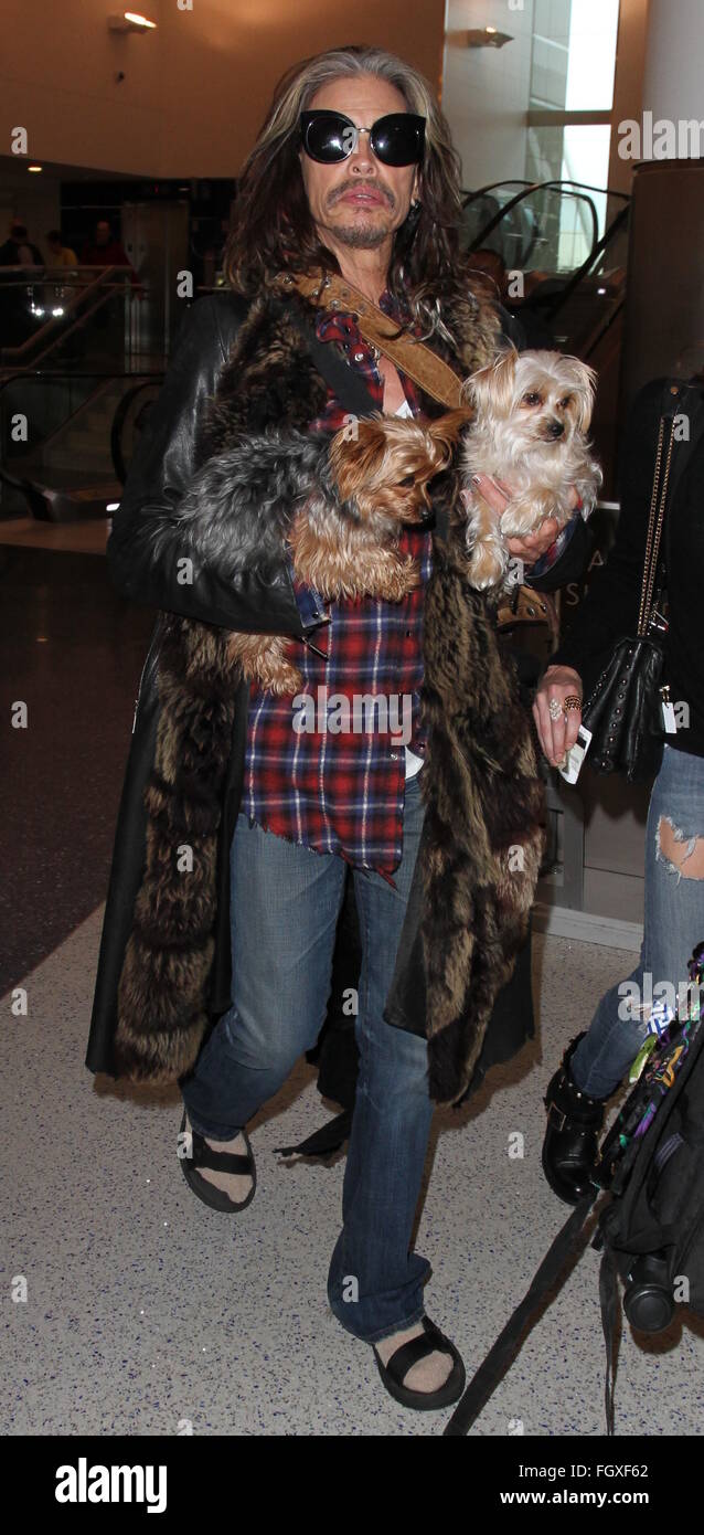 Steven Tyler arrives at Los Angeles International Airport with his two ...