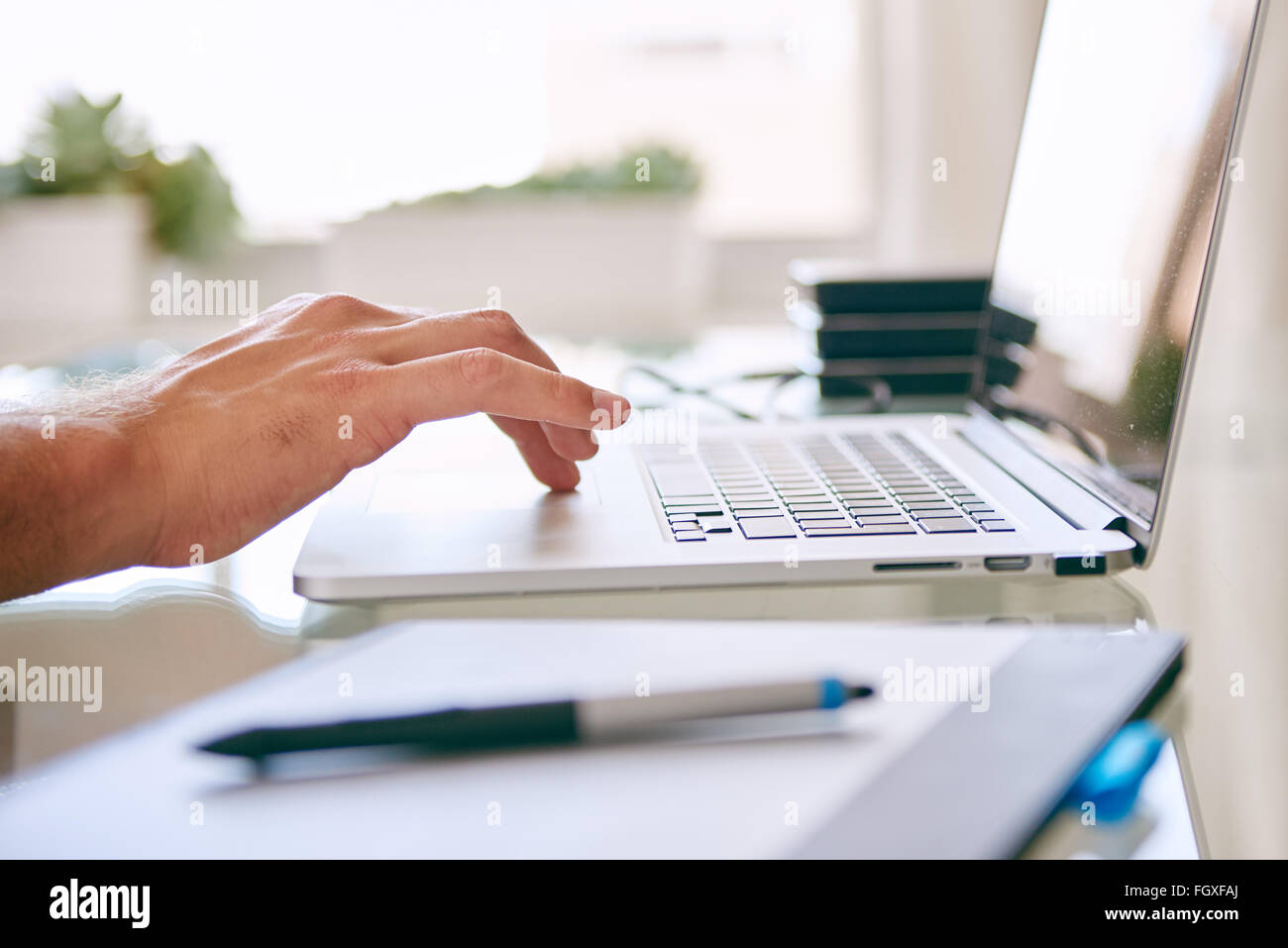 Scrolling laptop touchpad hi-res stock photography and images - Alamy