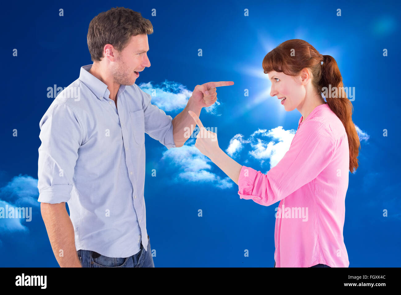 Composite image of couple arguing with each other Stock Photo - Alamy