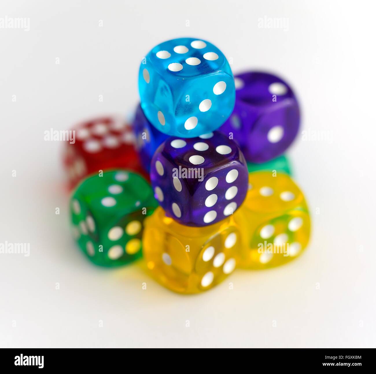 Assorted colored dice Stock Photo - Alamy