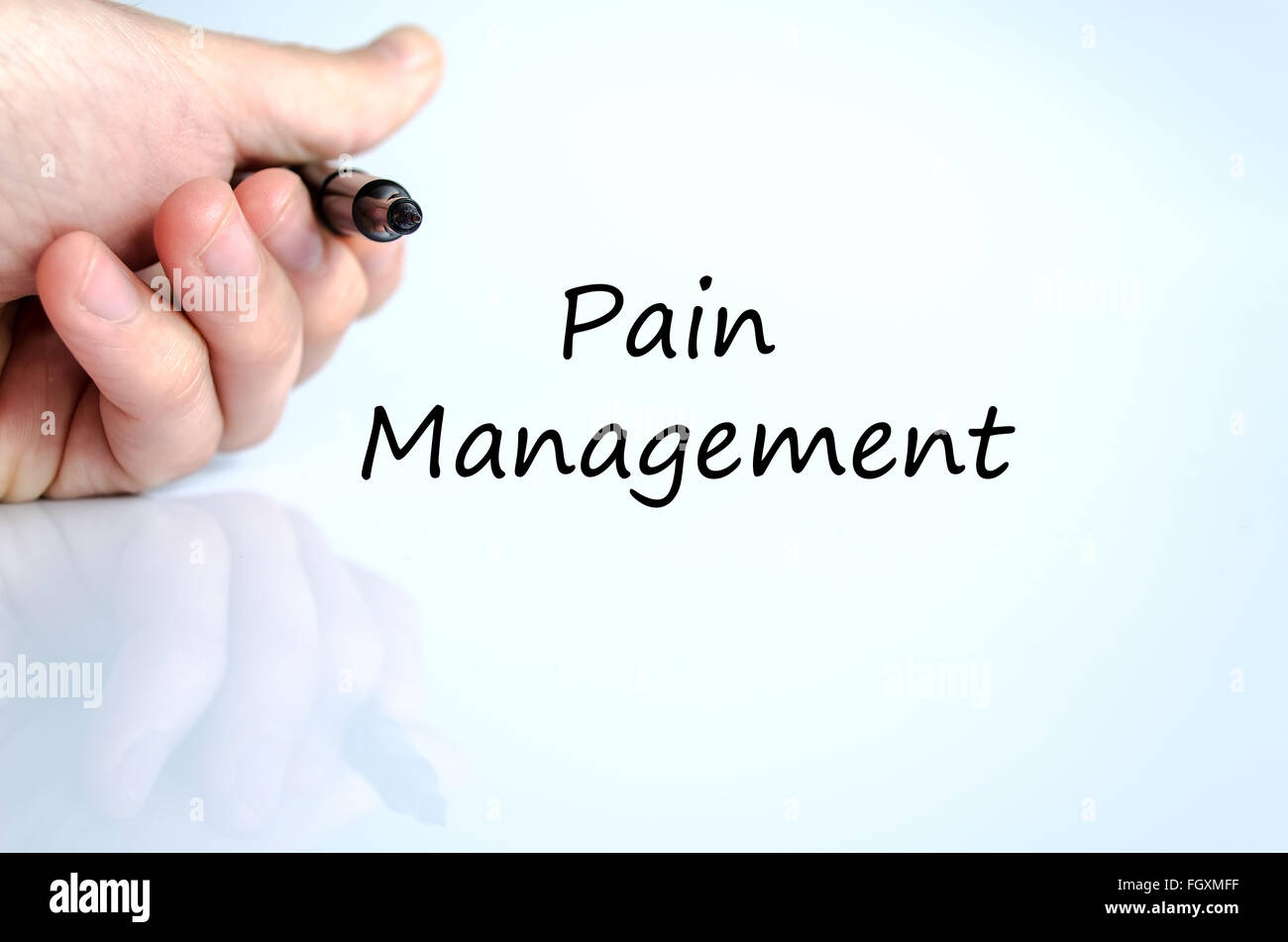 Business man hand writing pain management Stock Photo - Alamy