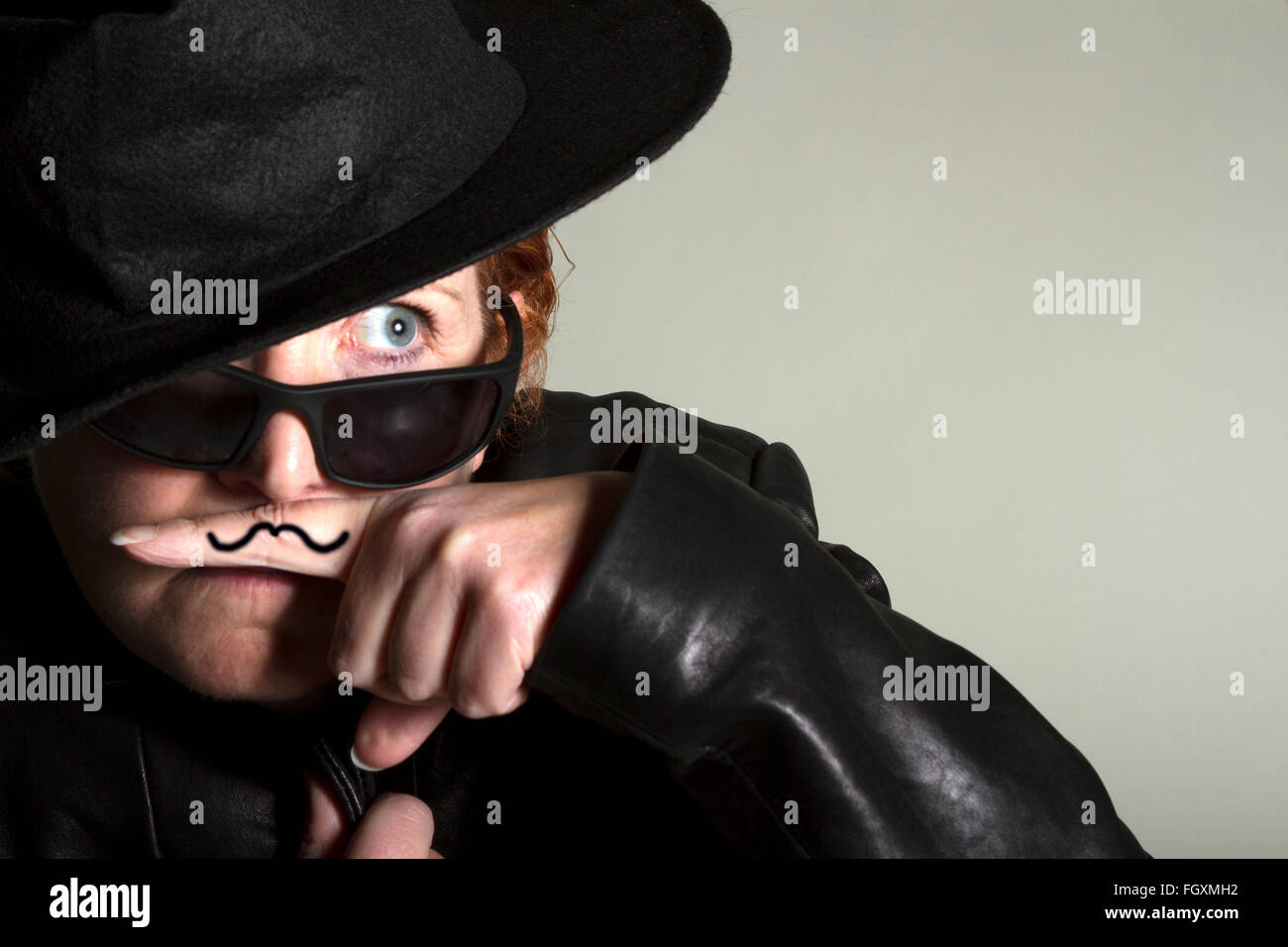 Wearing disguise hiding face hi-res stock photography and images - Alamy