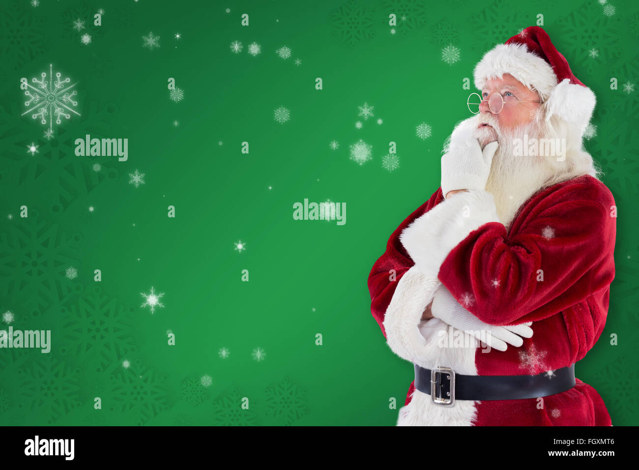 Composite image of santa is thinking about something Stock Photo - Alamy