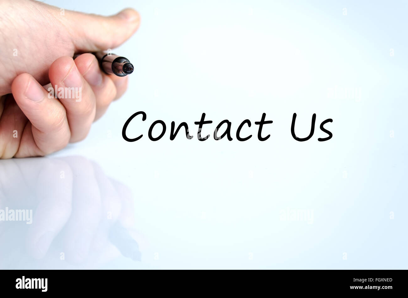 Business man hand writing contact us Stock Photo - Alamy