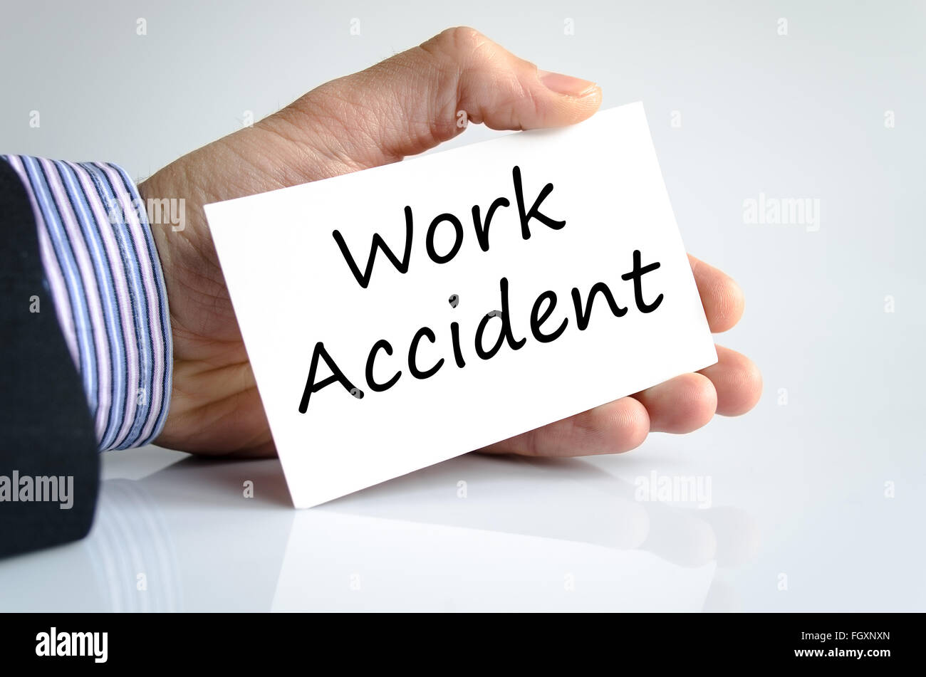 Business man hand writing work accident Stock Photo - Alamy