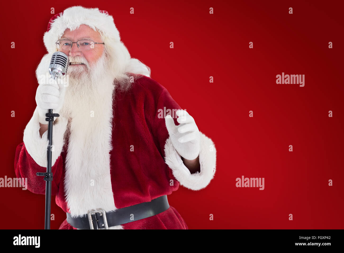 Composite image of santa claus is singing christmas songs Stock Photo ...