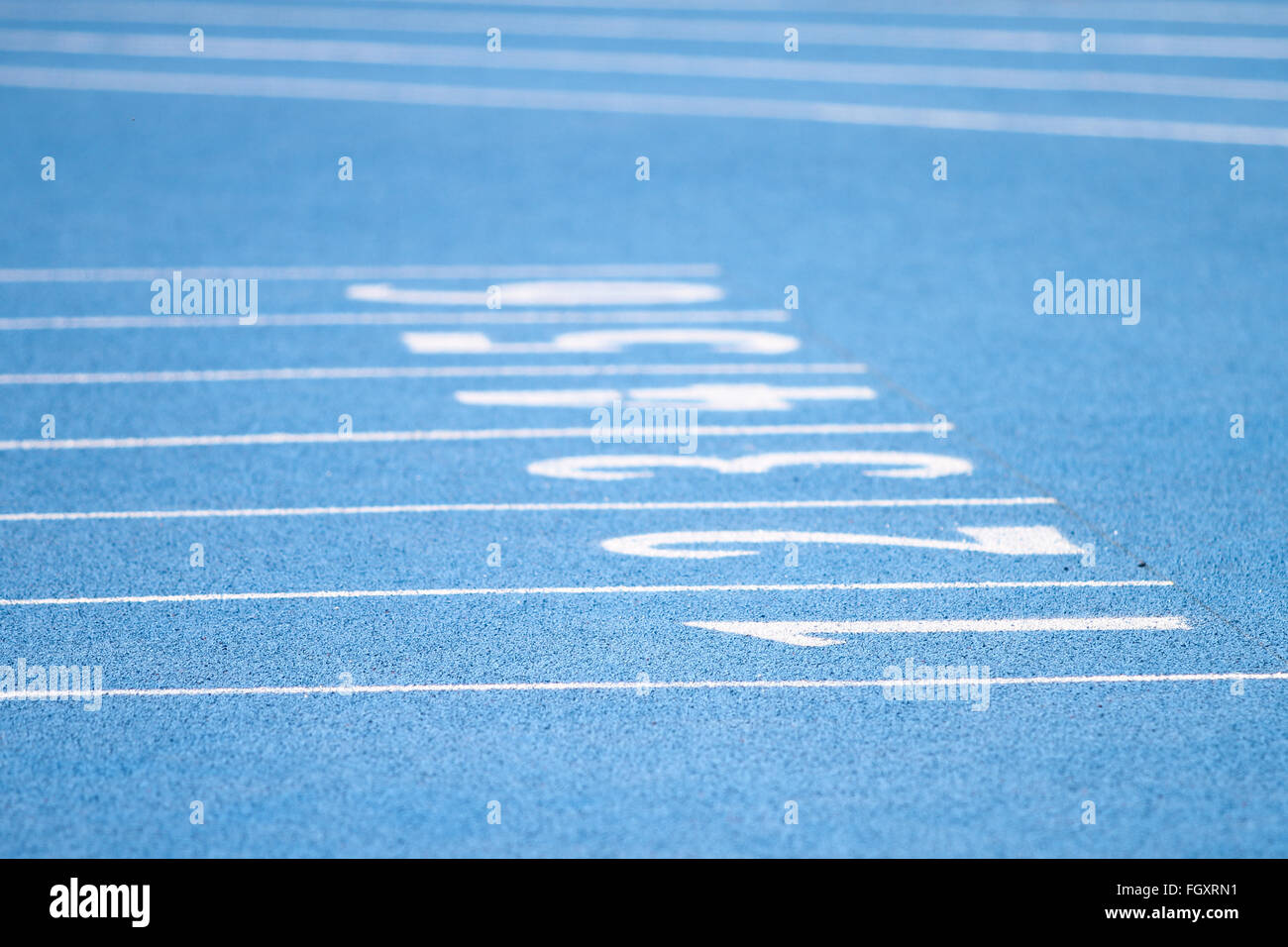 Numbers at finish line of 60 meters running field Stock Photo - Alamy