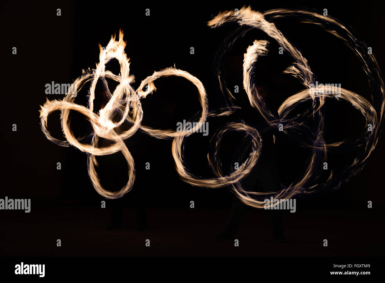 Fire poi in action by a male performance in Thai restaurant Stock Photo ...