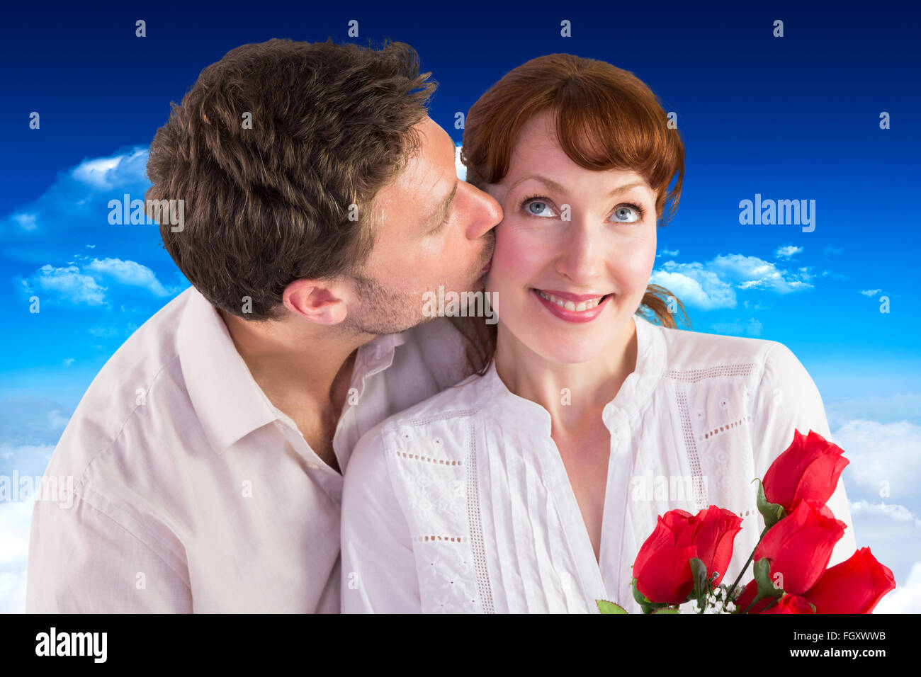 Composite image of woman getting roses from man Stock Photo - Alamy