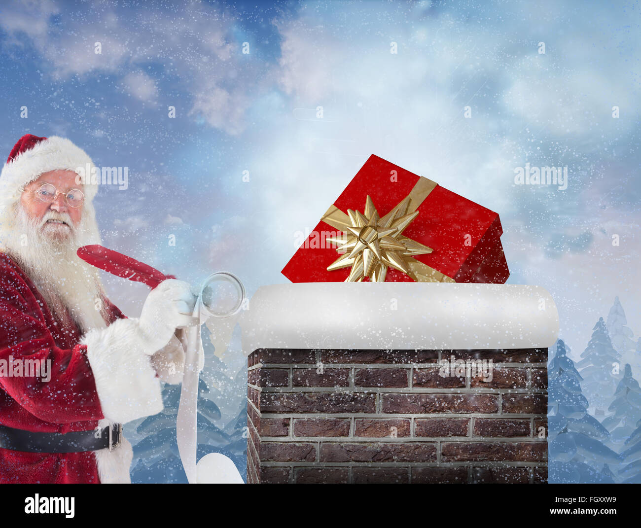 Composite image of santa writing his list Stock Photo - Alamy