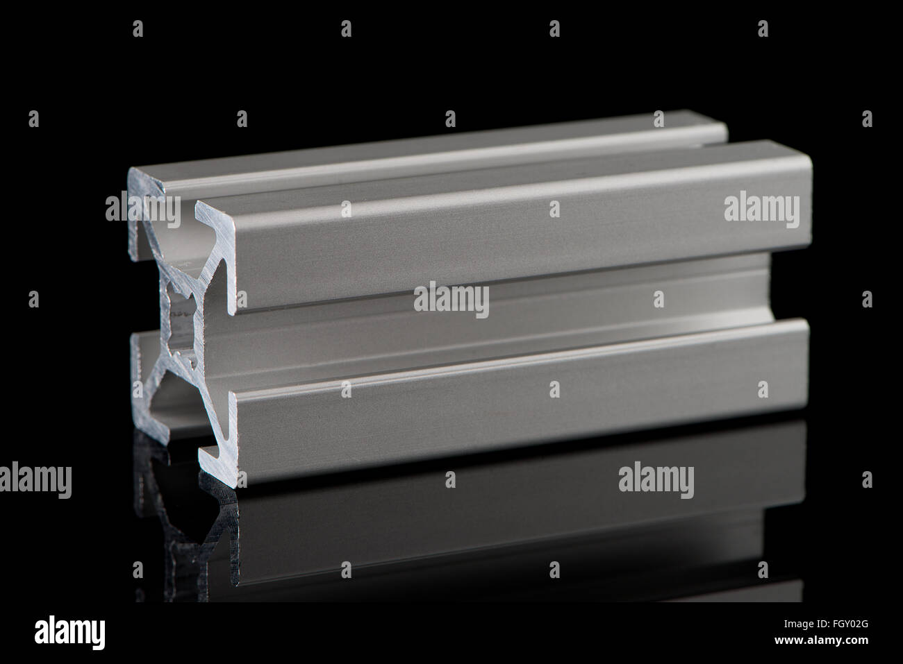Aluminium profile sample isolated on black background Stock Photo - Alamy