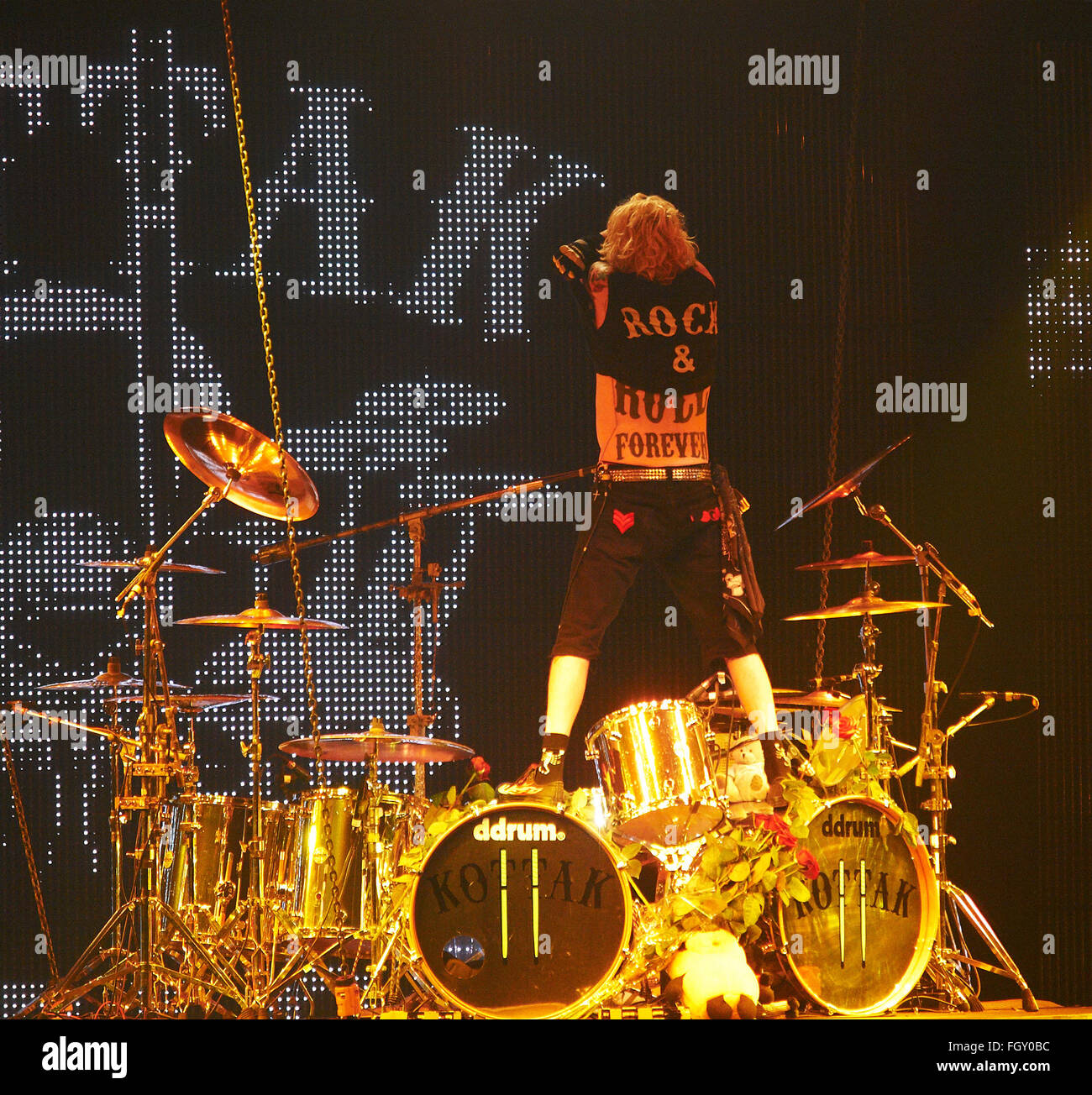 DNIPROPETROVSK, UKRAINE - OCTOBER 31, 2012: Drummer James Kottak takes ...