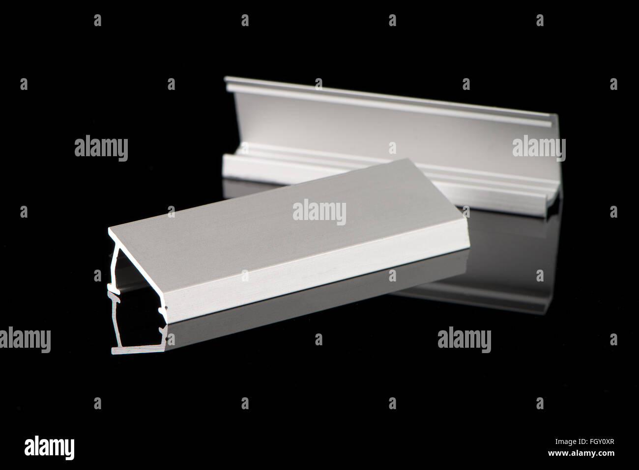 Aluminium profile sample isolated on black background Stock Photo - Alamy