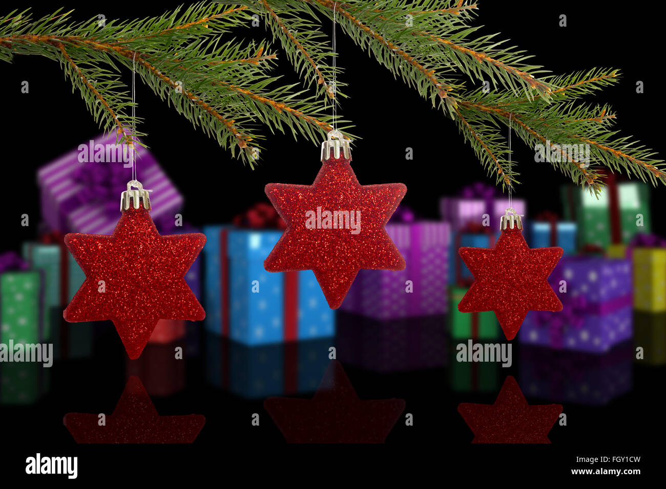 Composite image of star decorations on tree Stock Photo - Alamy