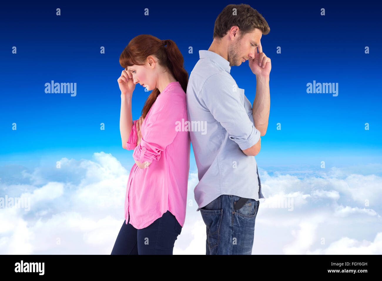 Composite image of irritated couple ignoring each other Stock Photo - Alamy