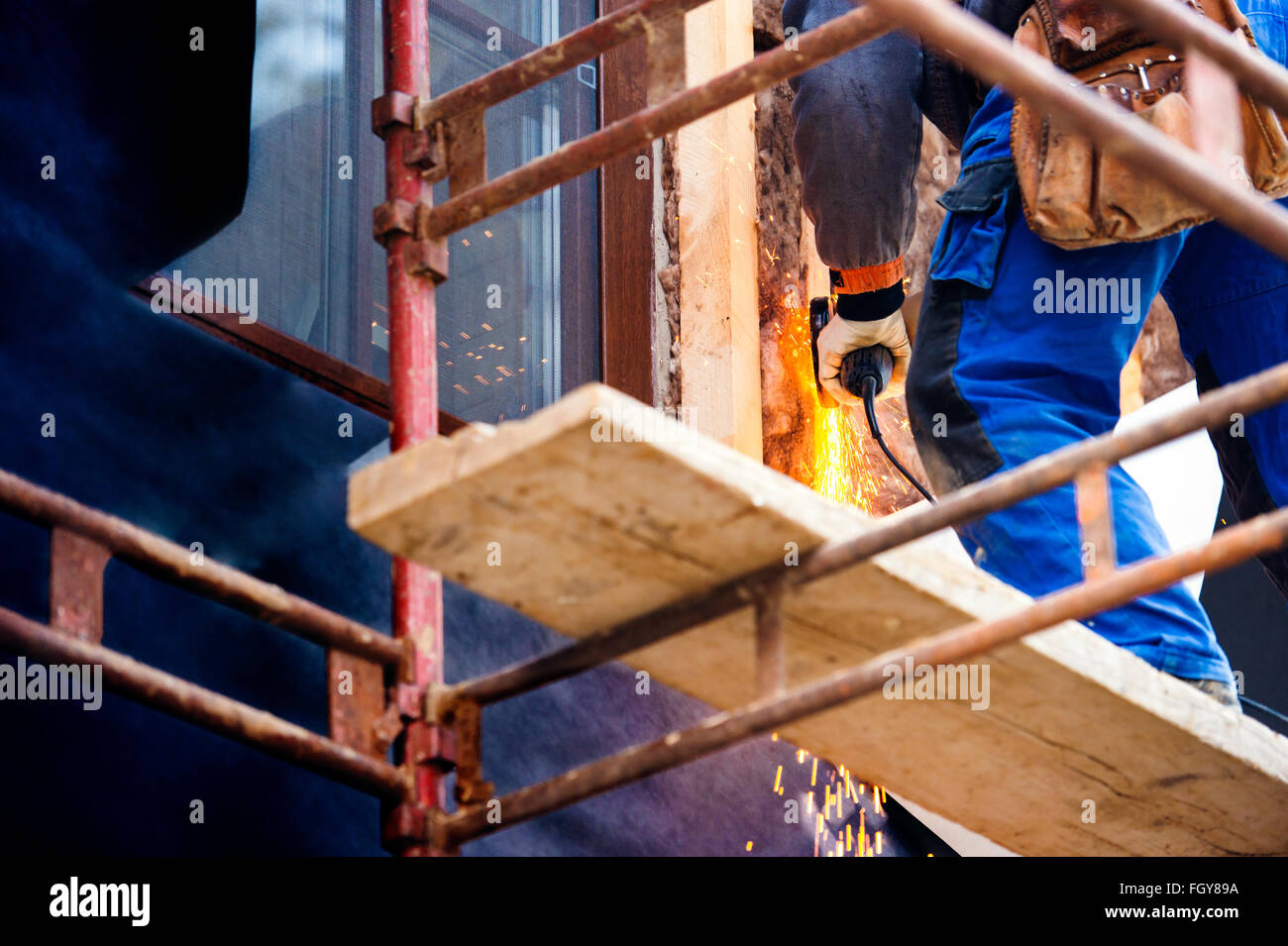 Construction worker insulating house with glass wool, close up Stock ...