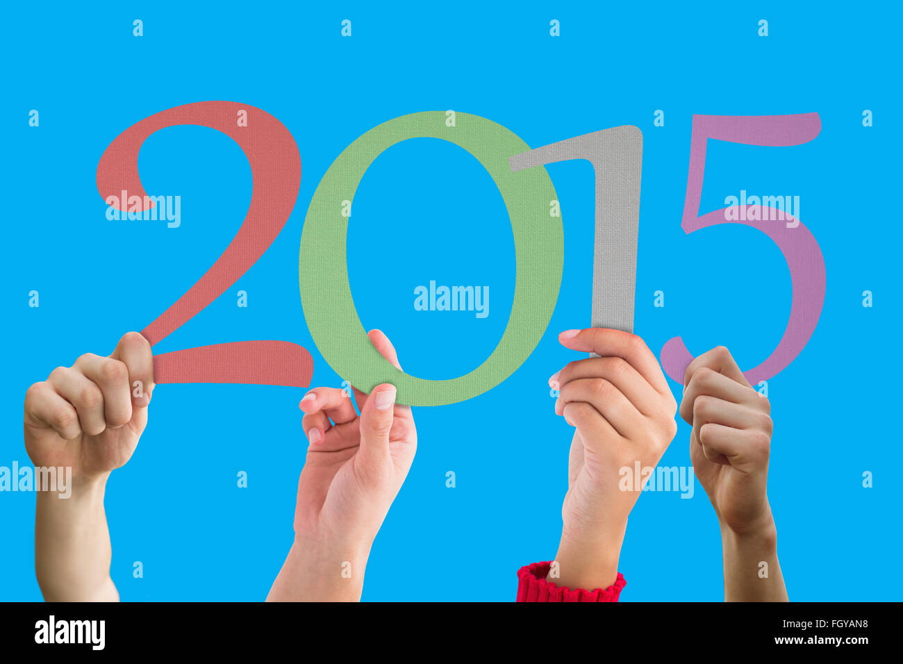 Composite image of hands holding poster Stock Photo - Alamy