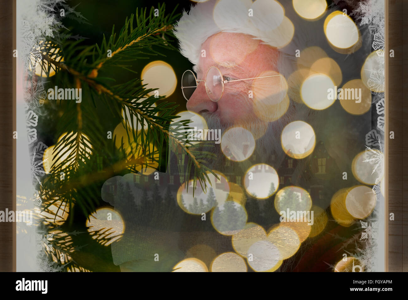Composite image of santa claus making quiet sign Stock Photo - Alamy