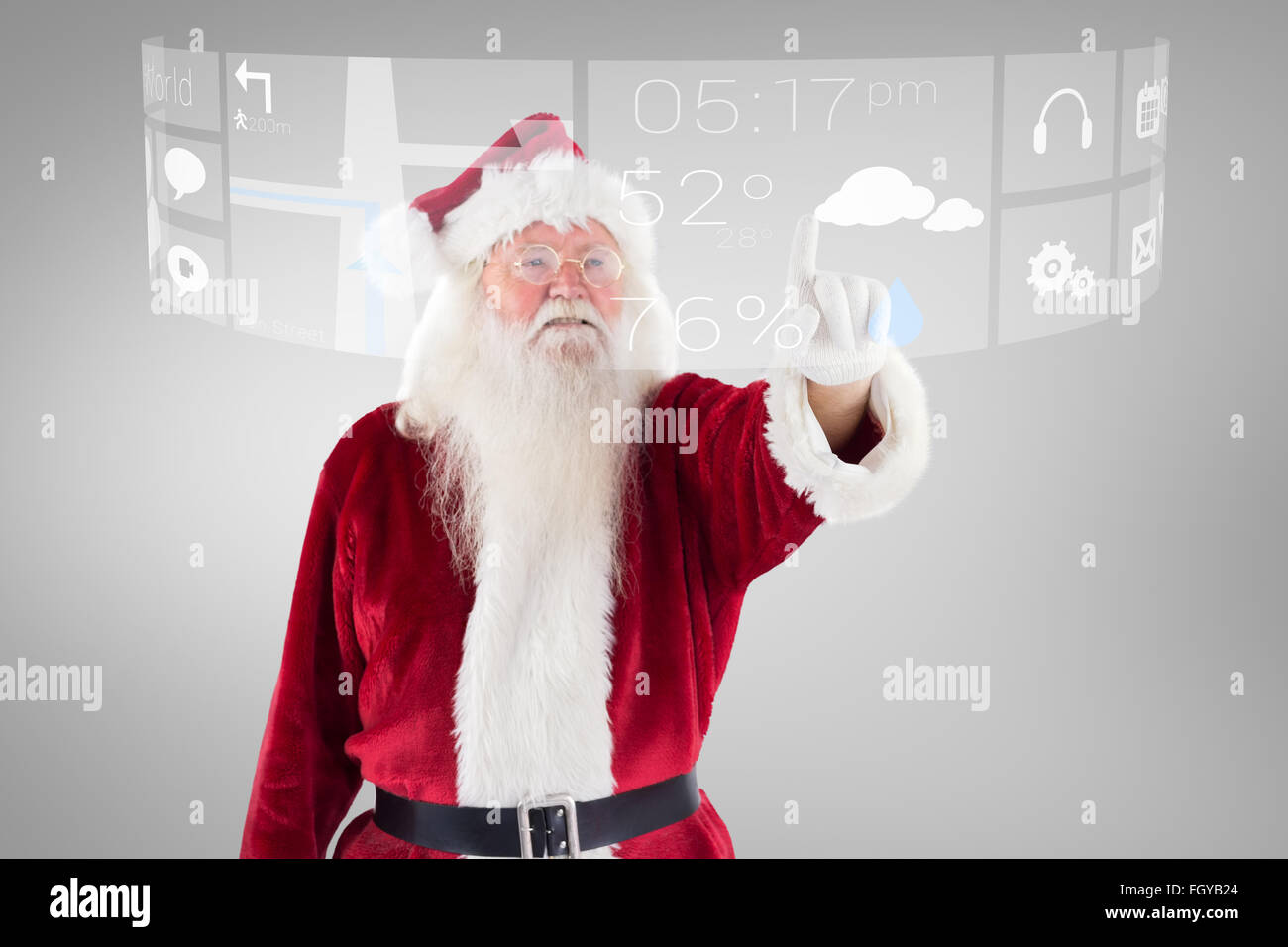 Composite image of santa claus points at something Stock Photo - Alamy