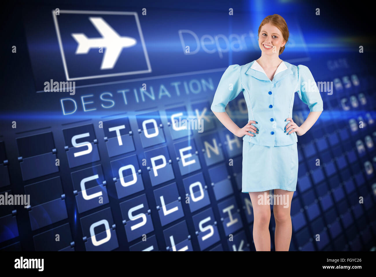 Composite image of pretty air hostess smiling at camera Stock Photo - Alamy