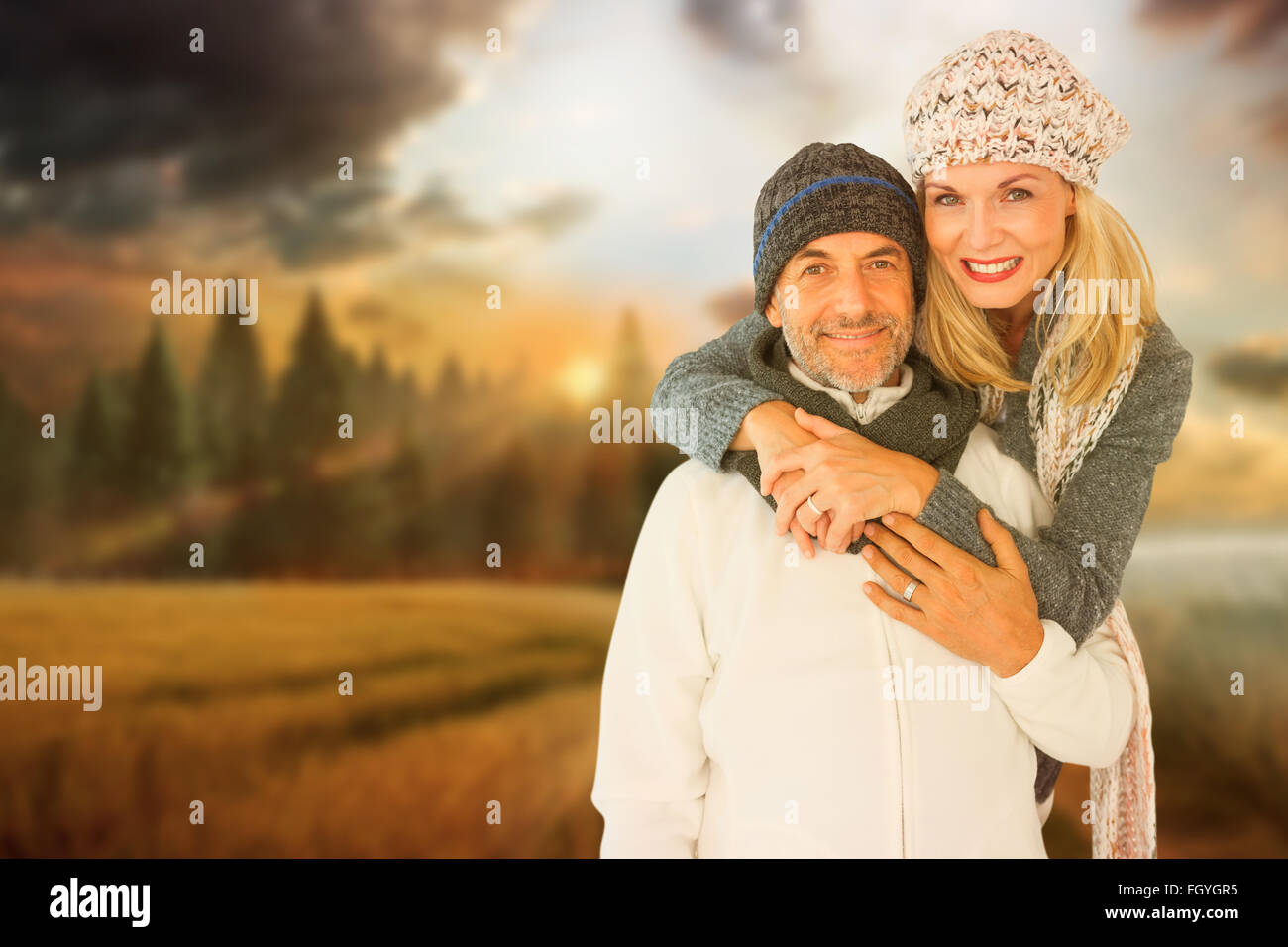 Composite image of portrait of wife embracing husband Stock Photo - Alamy