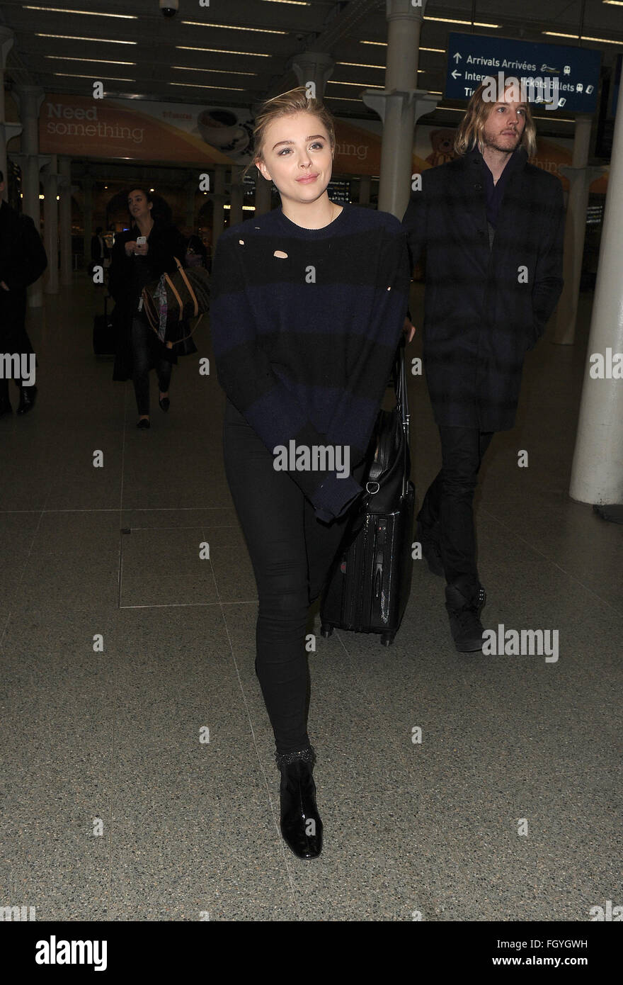 Chloe Moretz and her brother Trevor Duke Moretz arrive at Kings Cross ...