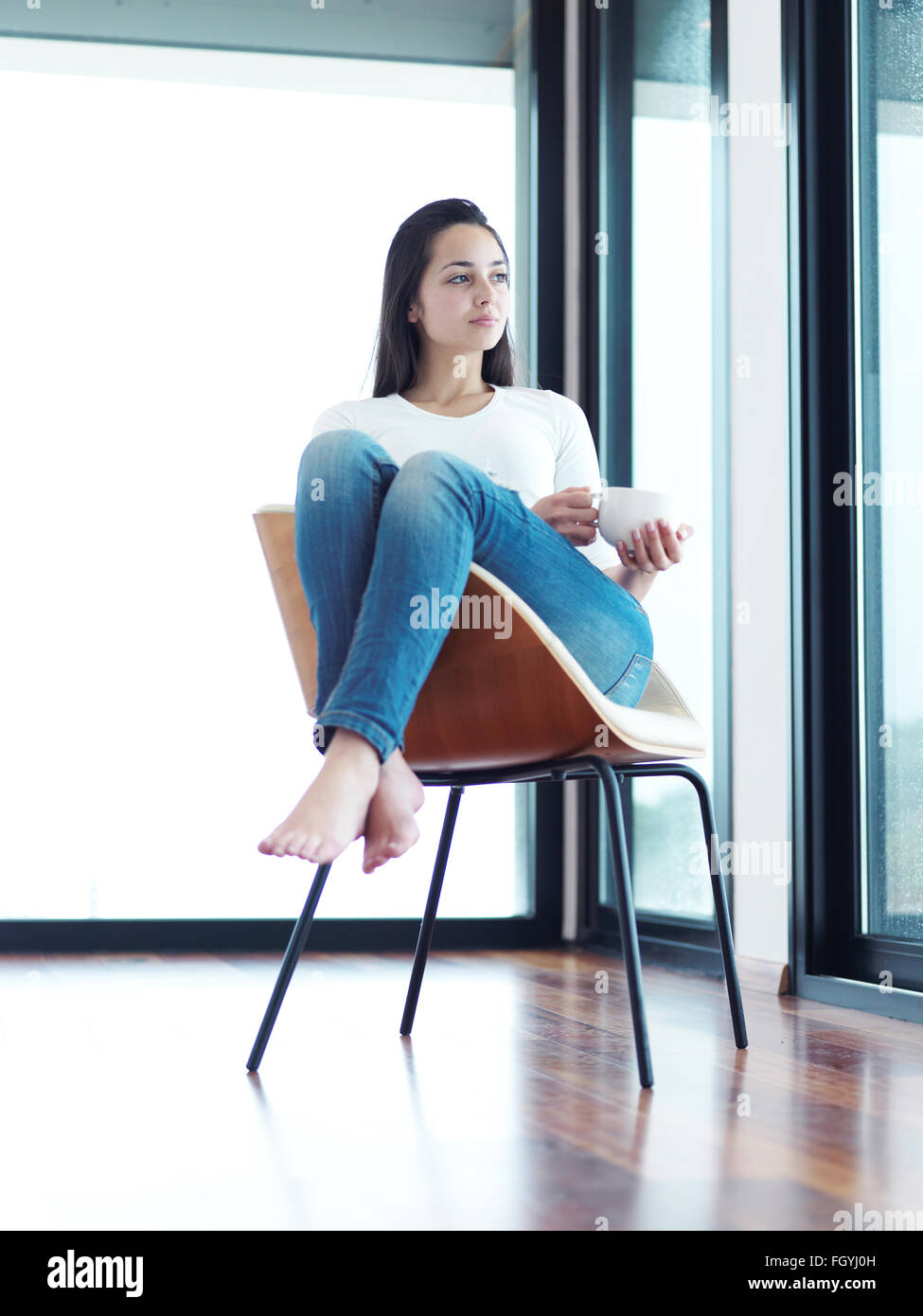 beautiful young woman drink first morning coffee Stock Photo - Alamy