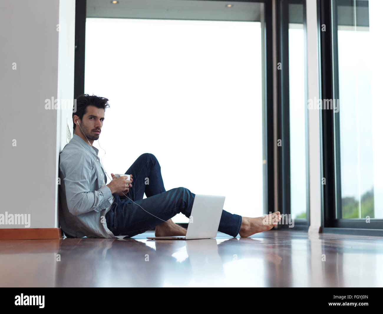 working on laptop computer from home Stock Photo - Alamy