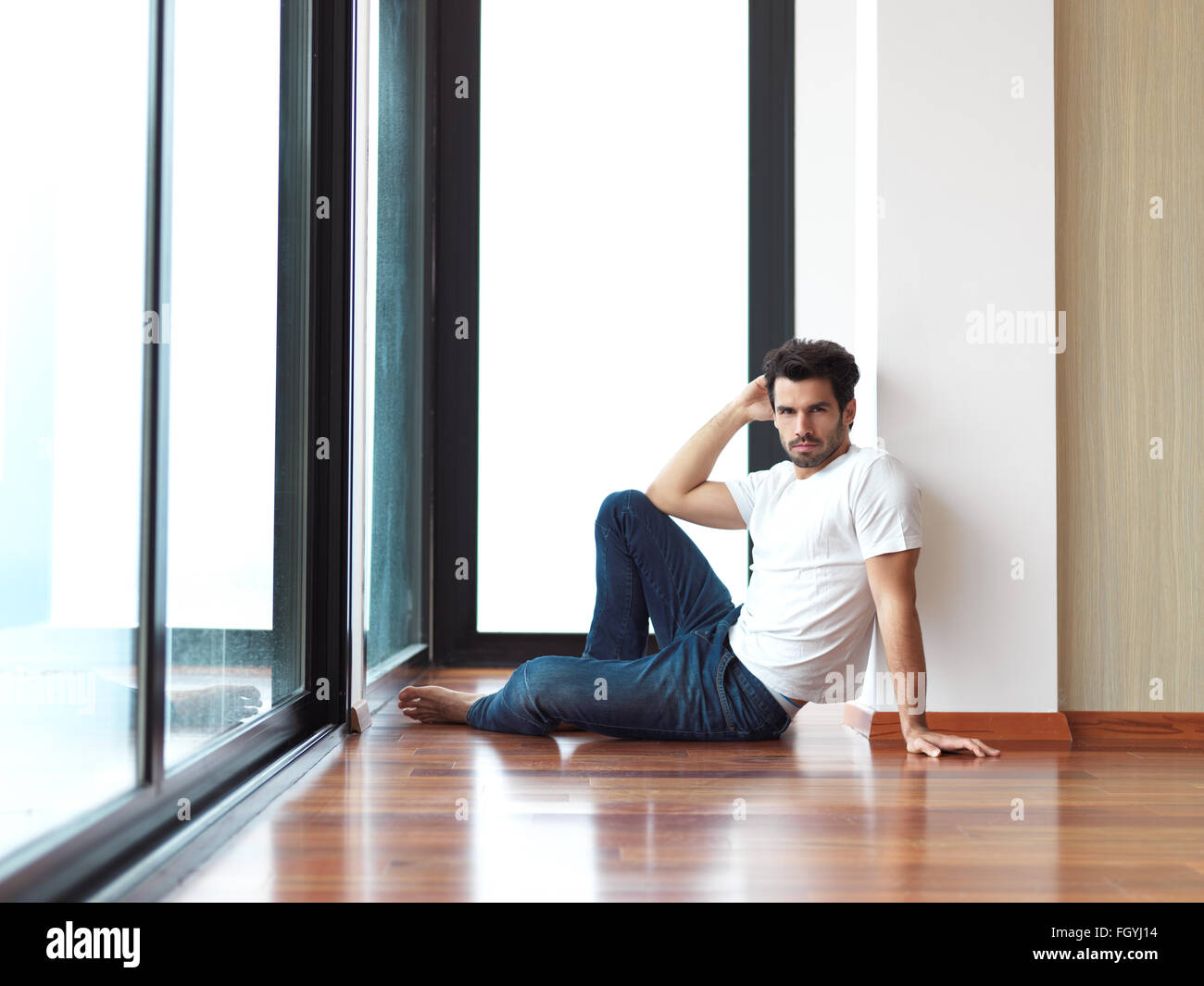 relaxed young man drink first morning coffee Stock Photo - Alamy
