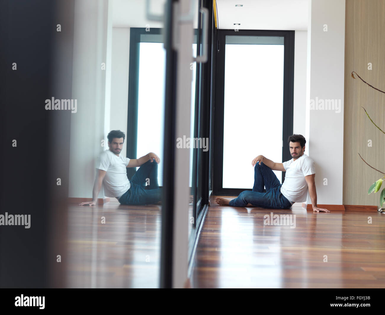 relaxed young man drink first morning coffee Stock Photo - Alamy