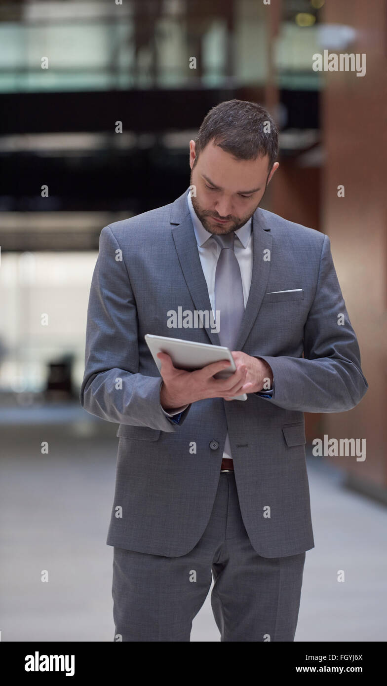 business man with tablet Stock Photo - Alamy