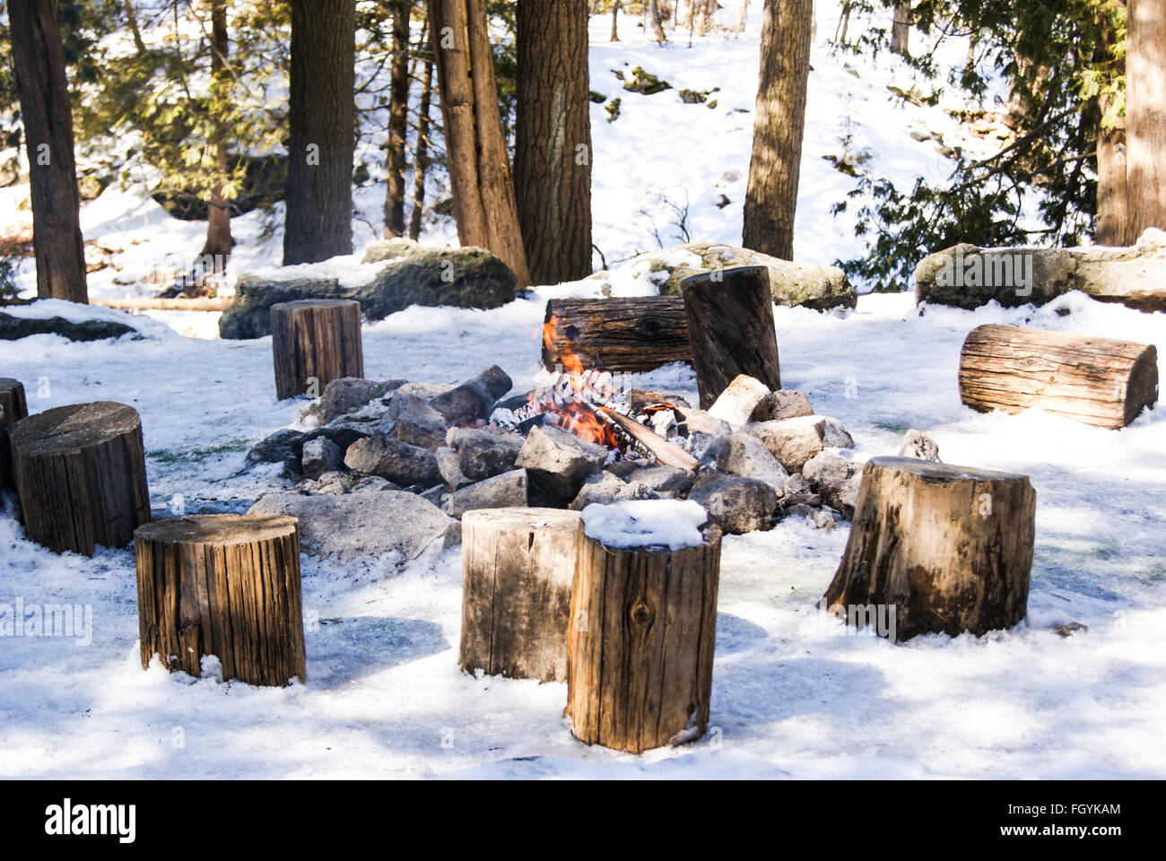 Fire on the snow Stock Photo - Alamy